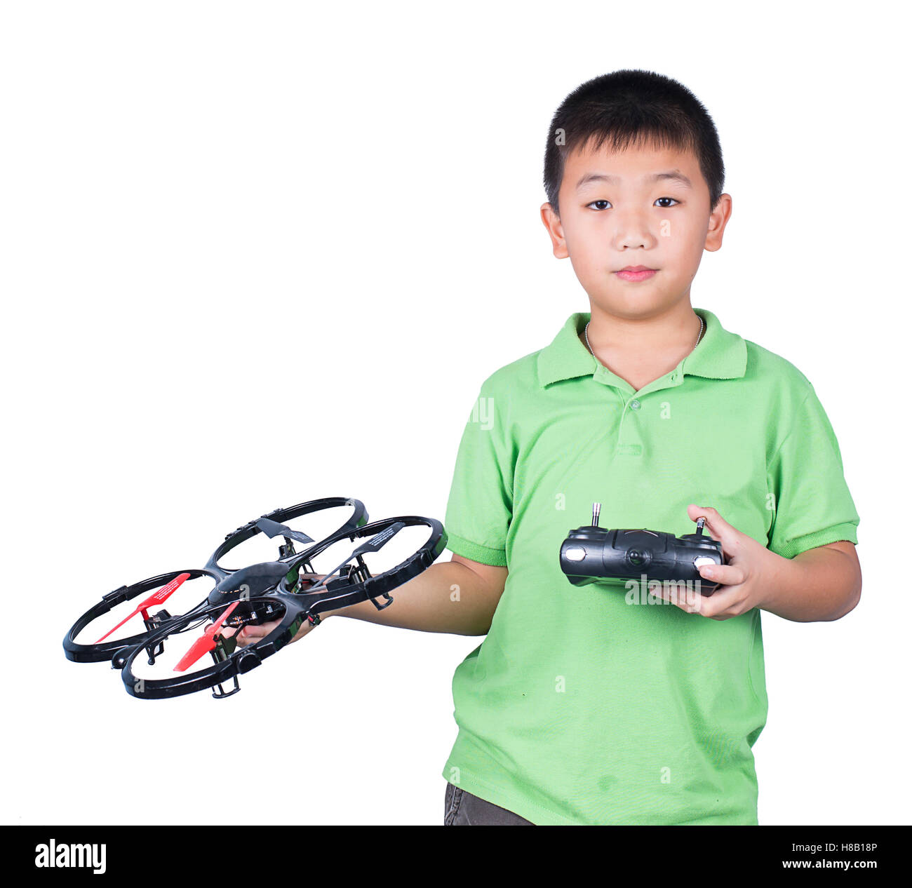 Little boy holding a radio remote control (controlling handset) for ...