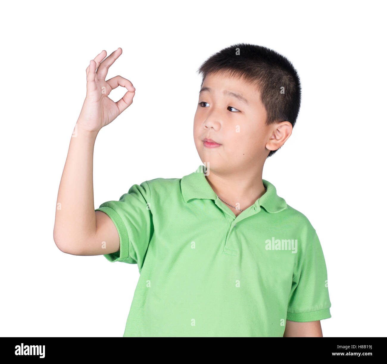 Cute boy making Ok sign isolated on white background Stock Photo - Alamy
