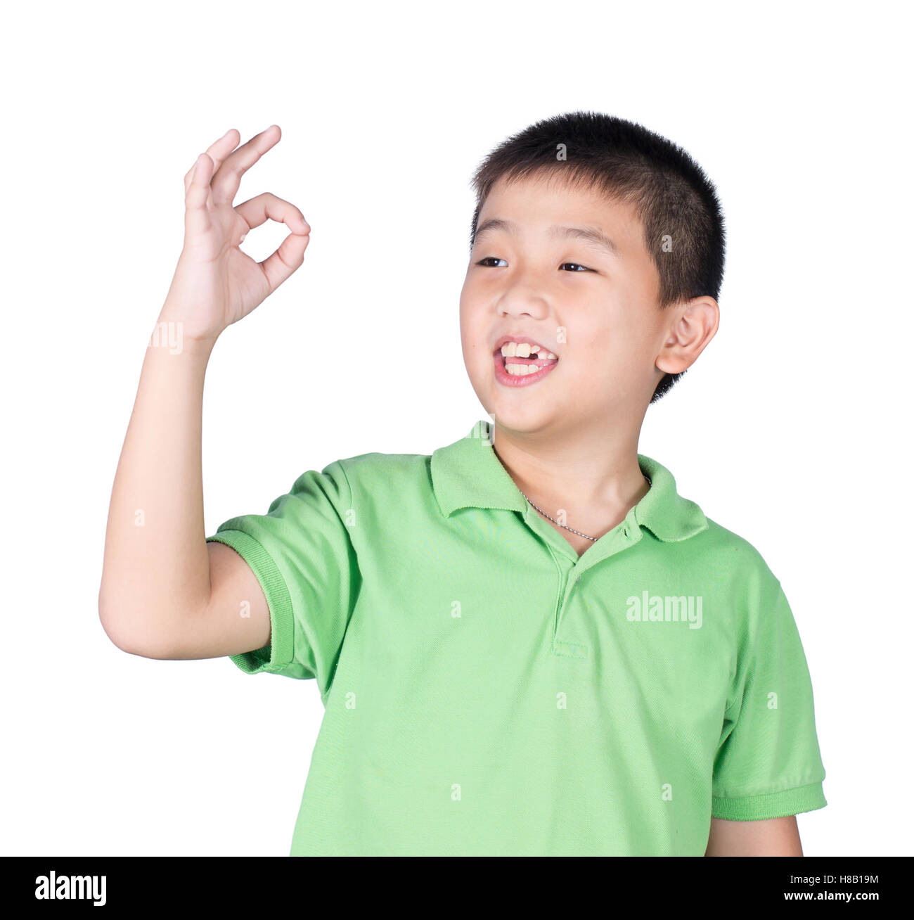 Cute boy making Ok sign isolated on white background Stock Photo - Alamy
