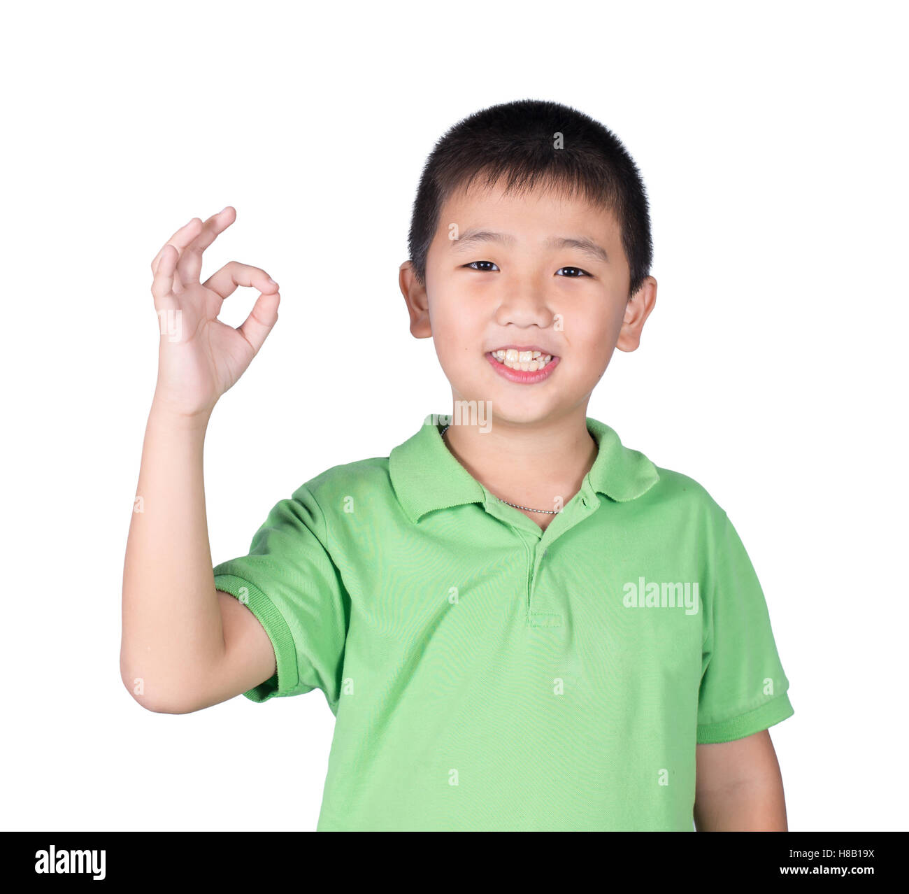 Cute boy making Ok sign isolated on white background Stock Photo - Alamy