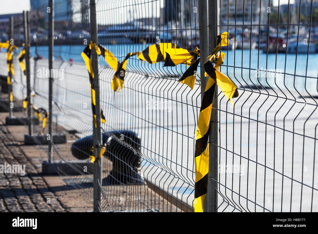 fence with ribbons on a construction site Stock Photo - Alamy