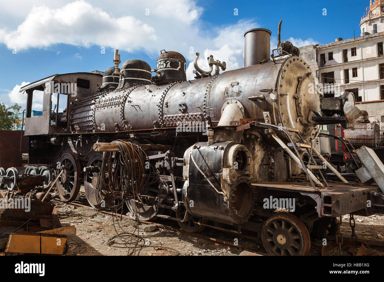 old and rusty steam locomotive on background of sky Stock Photo - Alamy