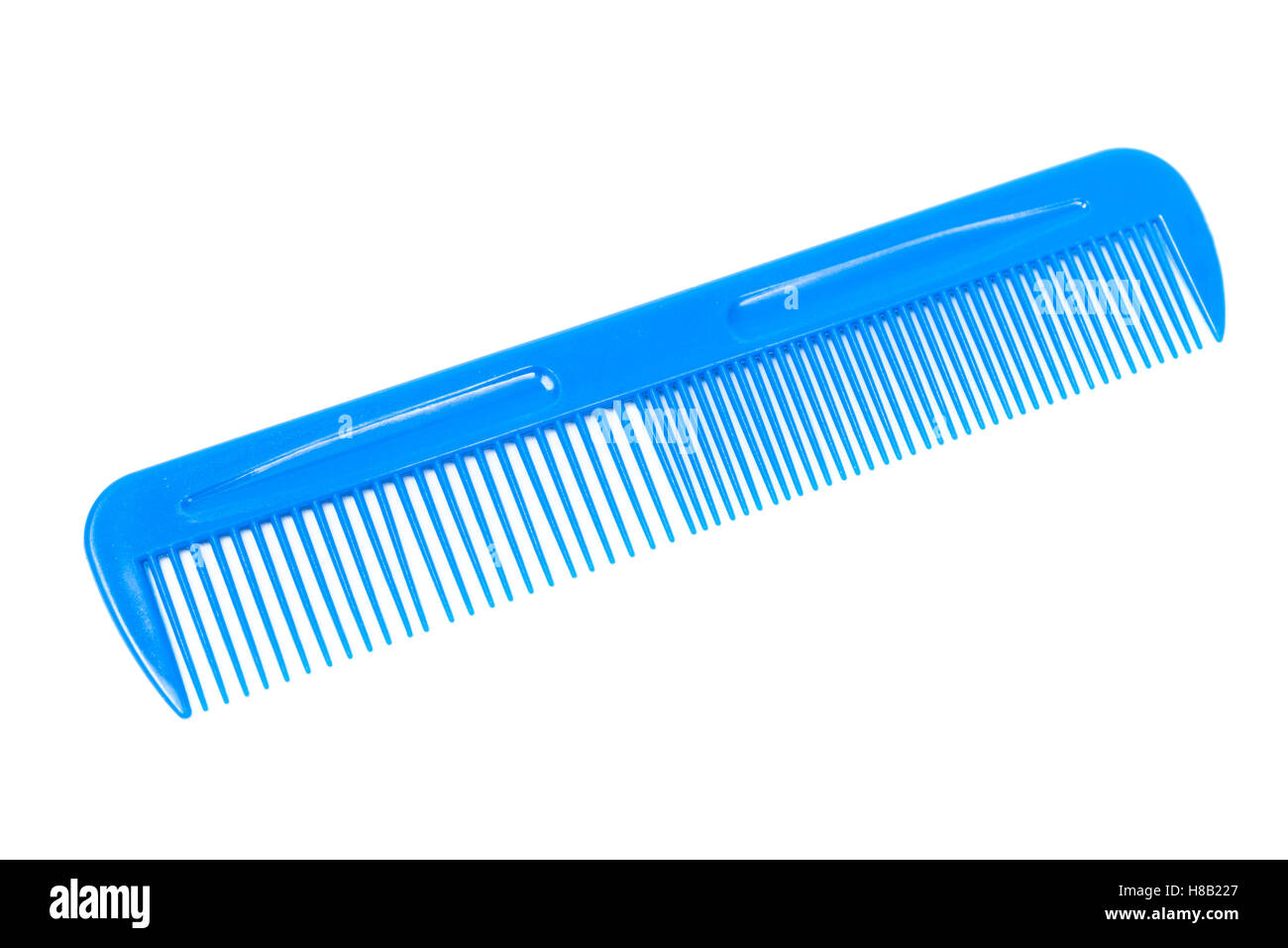 blue plastic comb on a white background Stock Photo - Alamy
