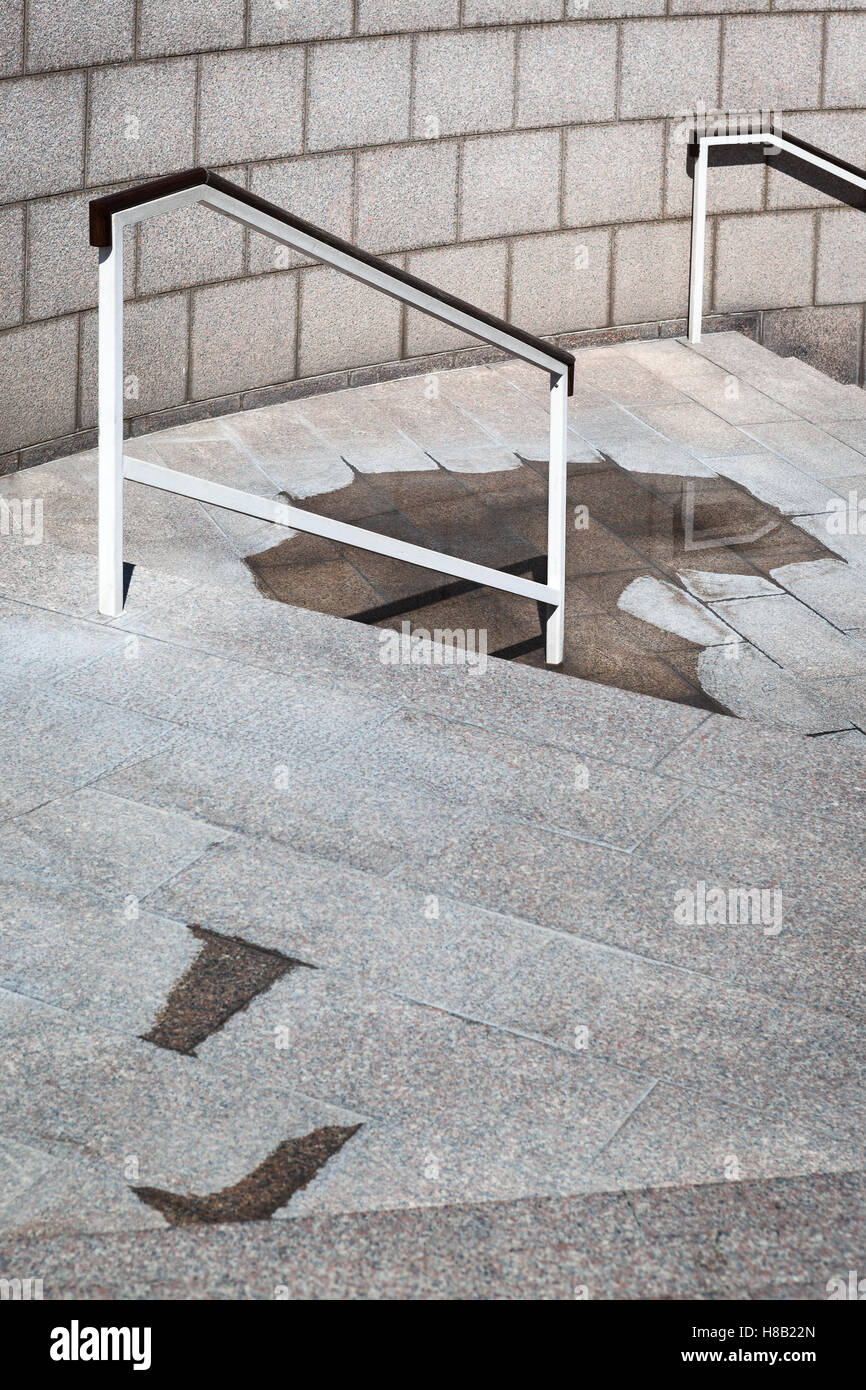 rain puddle on the stairs Stock Photo - Alamy