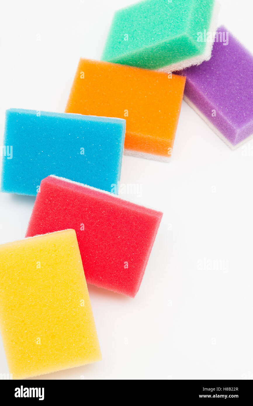 color sponges for washing dishes on white background Stock Photo - Alamy