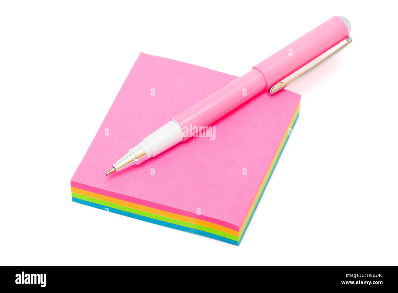 pen on sticky note on a white background Stock Photo - Alamy