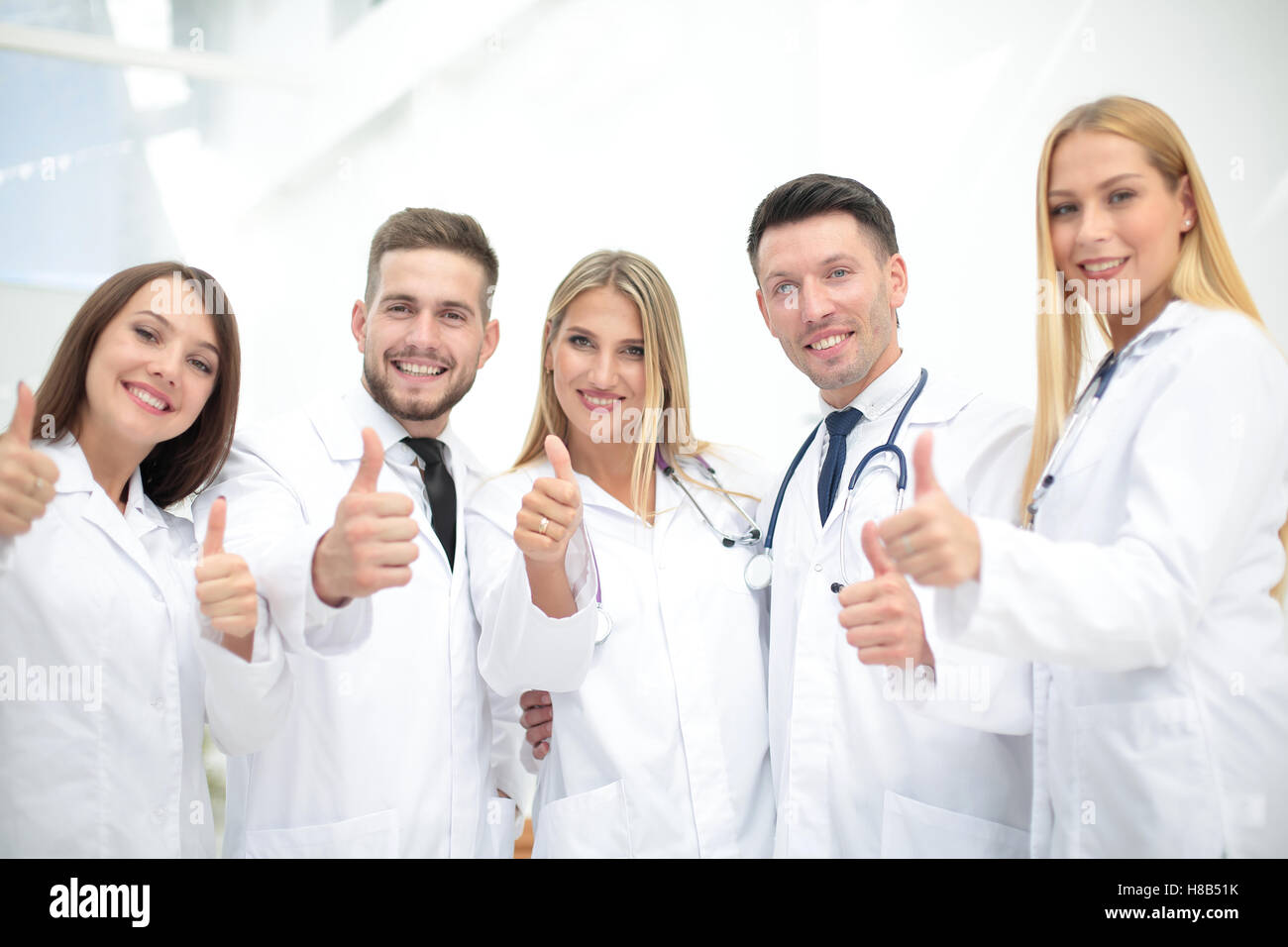 Portrait doctors nurses thumbs hi-res stock photography and images - Alamy
