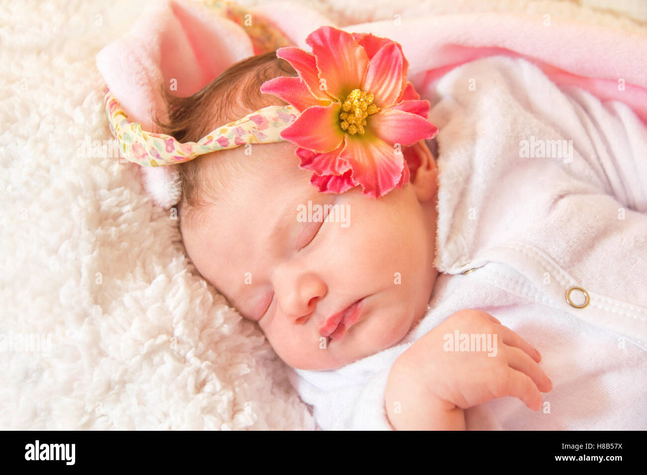 Sweet newborn baby girl sleeping Stock Photo - Alamy