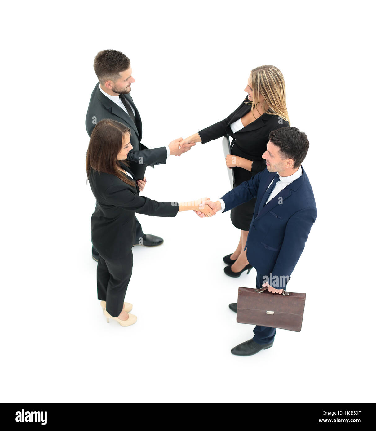 Group business professionals shake hands hi-res stock photography and ...
