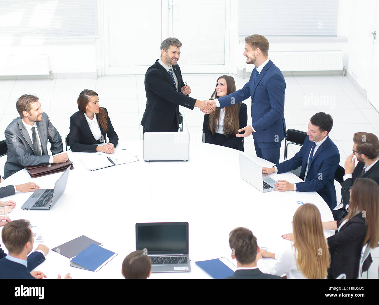 Round table discussion at Business convention and handshake. Aud Stock ...