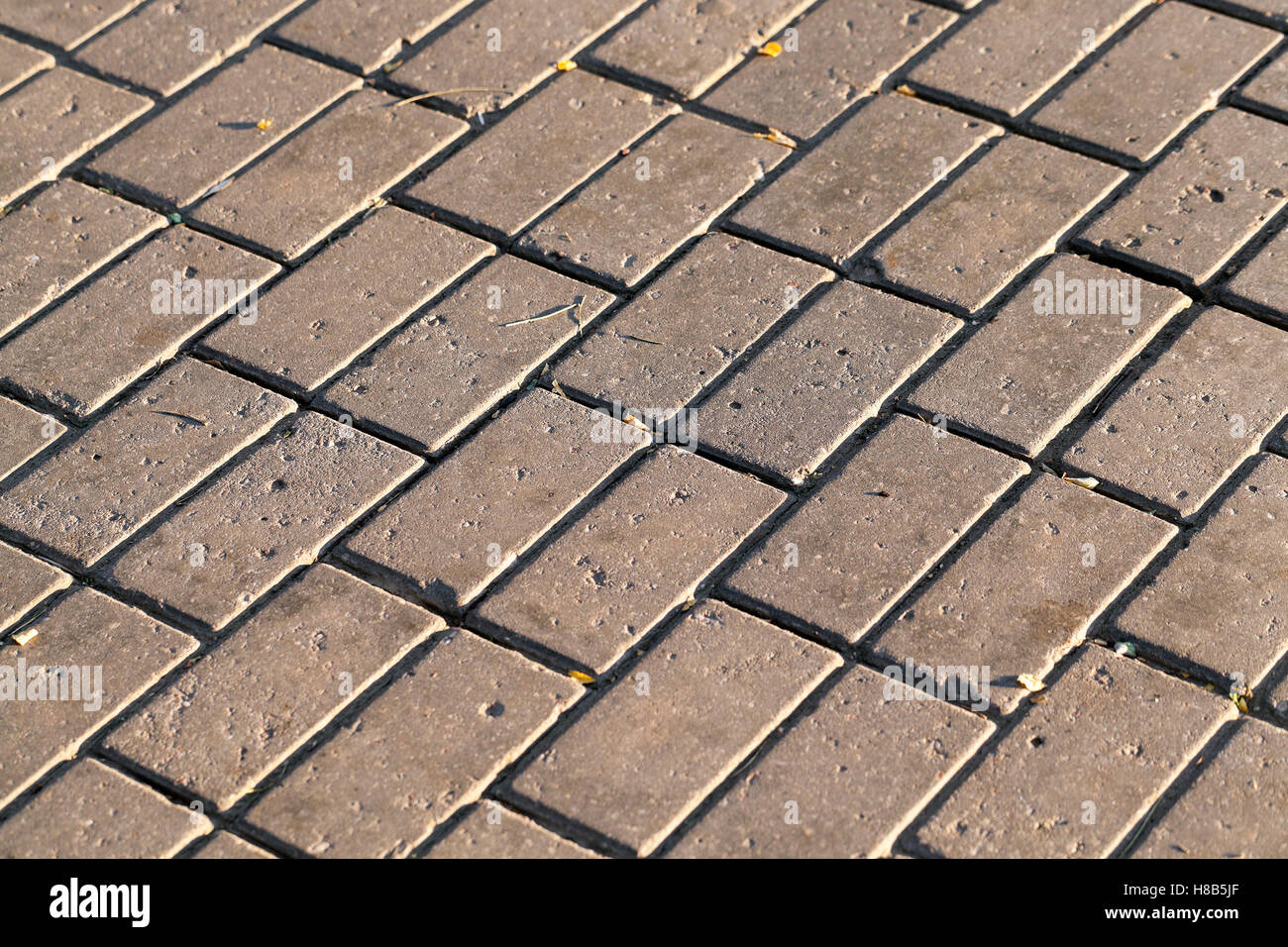 the road from the concrete tiles Stock Photo - Alamy