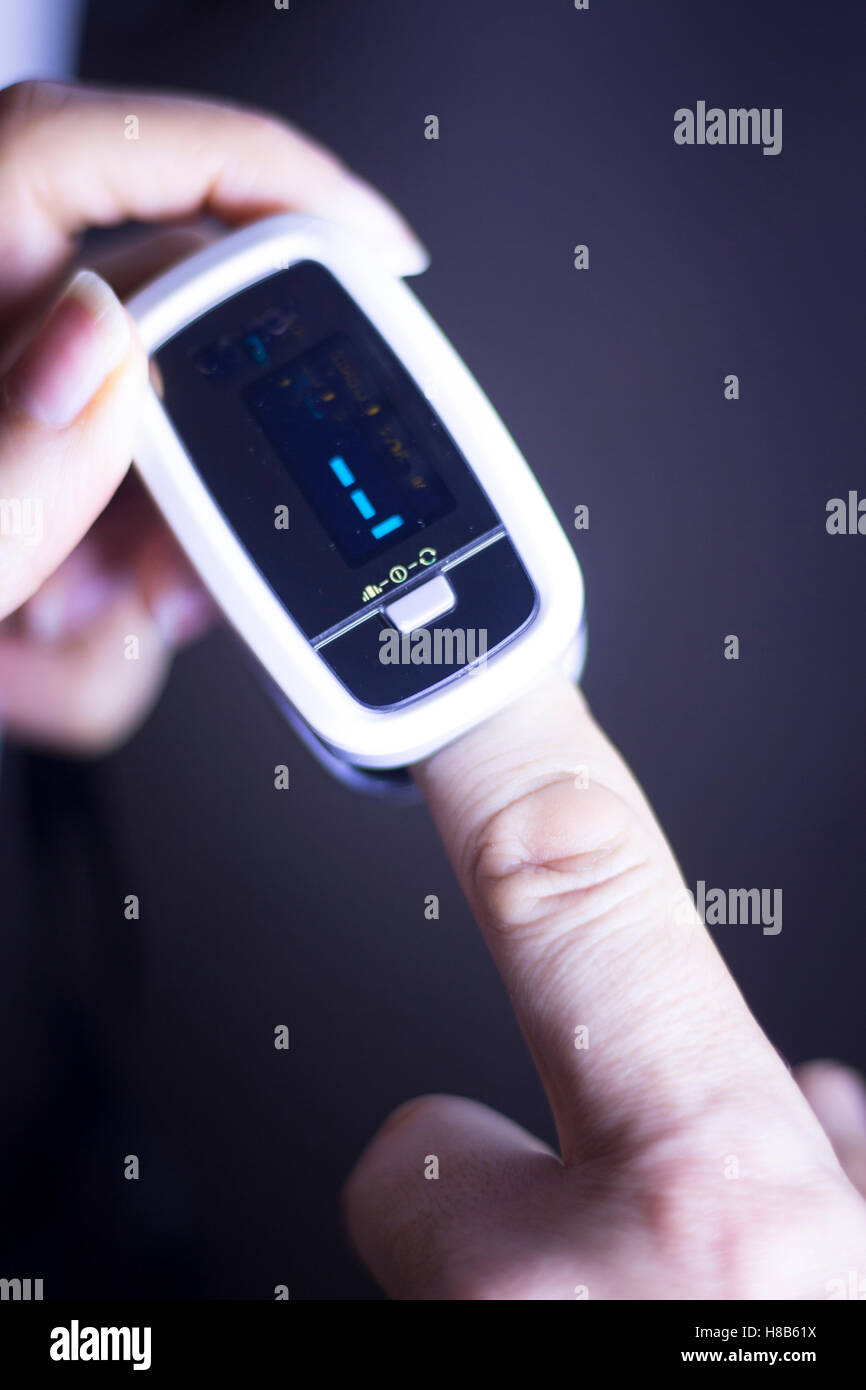 Portable hand held mini domestic cardiac finger pulse rate meter to ...