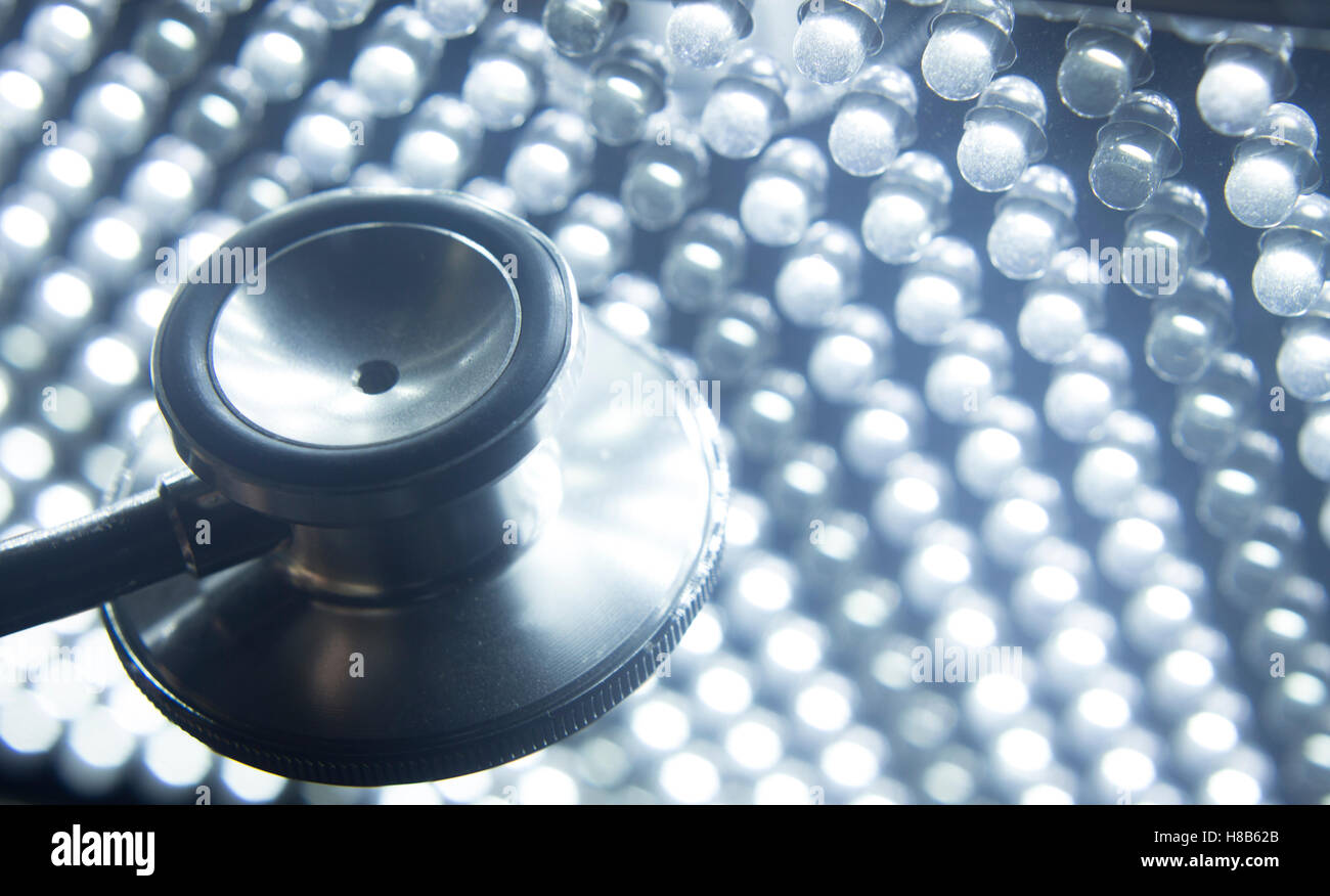 Medical doctor's stethoscope used to listen to patient heart rate ...