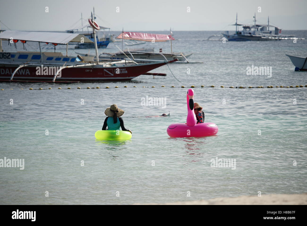 kids playing in ocean Stock Photo - Alamy