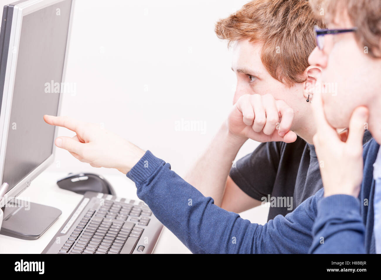 men doing teamwork in their office in front of an EMPTY (free for your ...