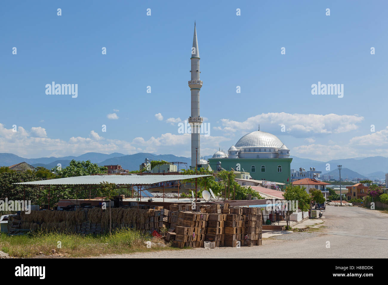 A pile of wooden boxes against the background of the mosque,Mosque ...