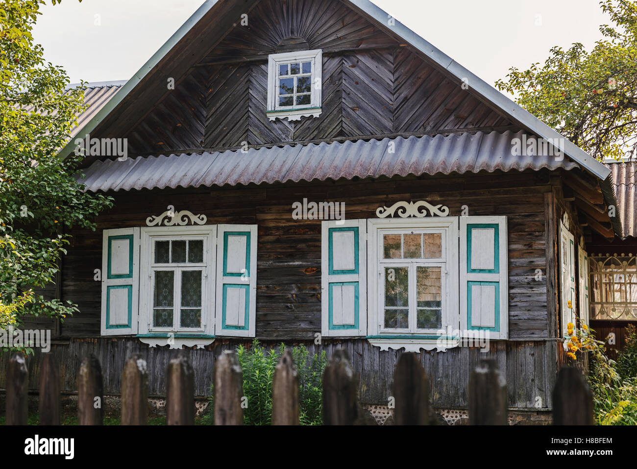 Old wooden house with shutters Stock Photo - Alamy