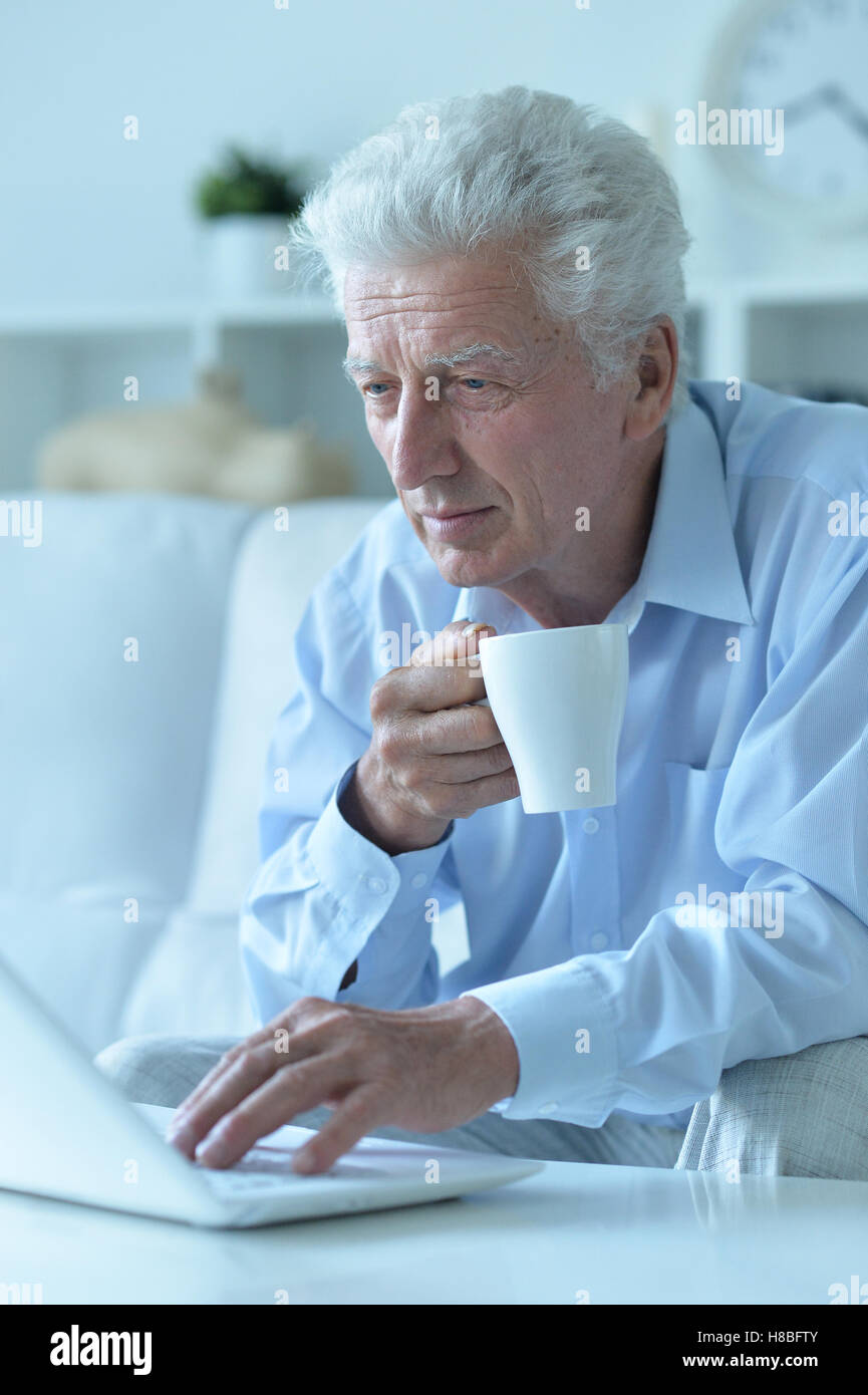 Senior man at home Stock Photo - Alamy