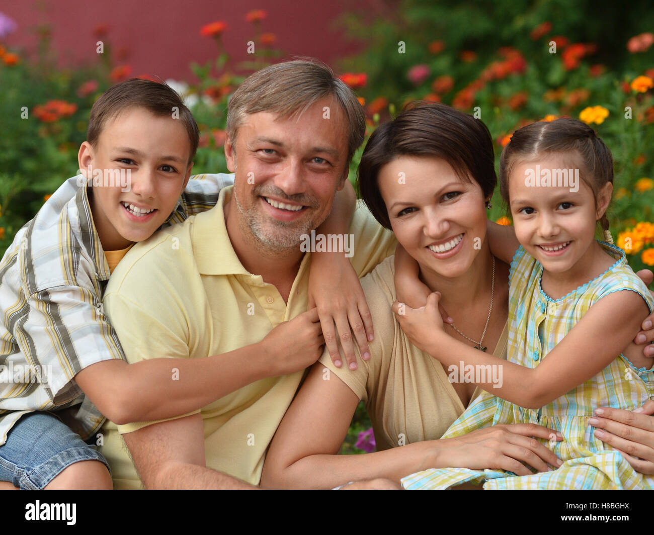 Family resting in summer park Stock Photo - Alamy