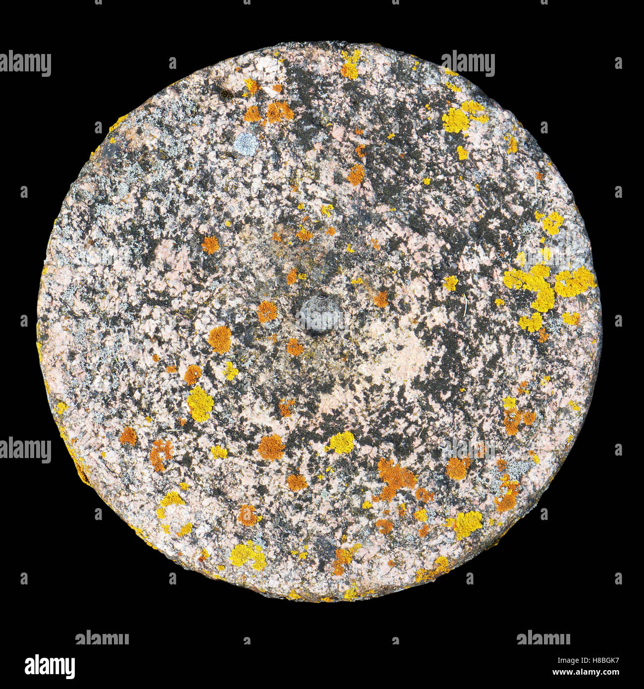 Stone granite wheel isolated on black Stock Photo - Alamy