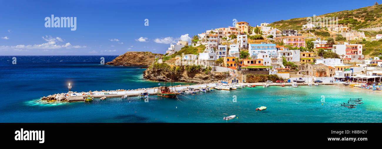 Crete, Greece. Harbour with marine vessels, boats and lighthouse. View ...