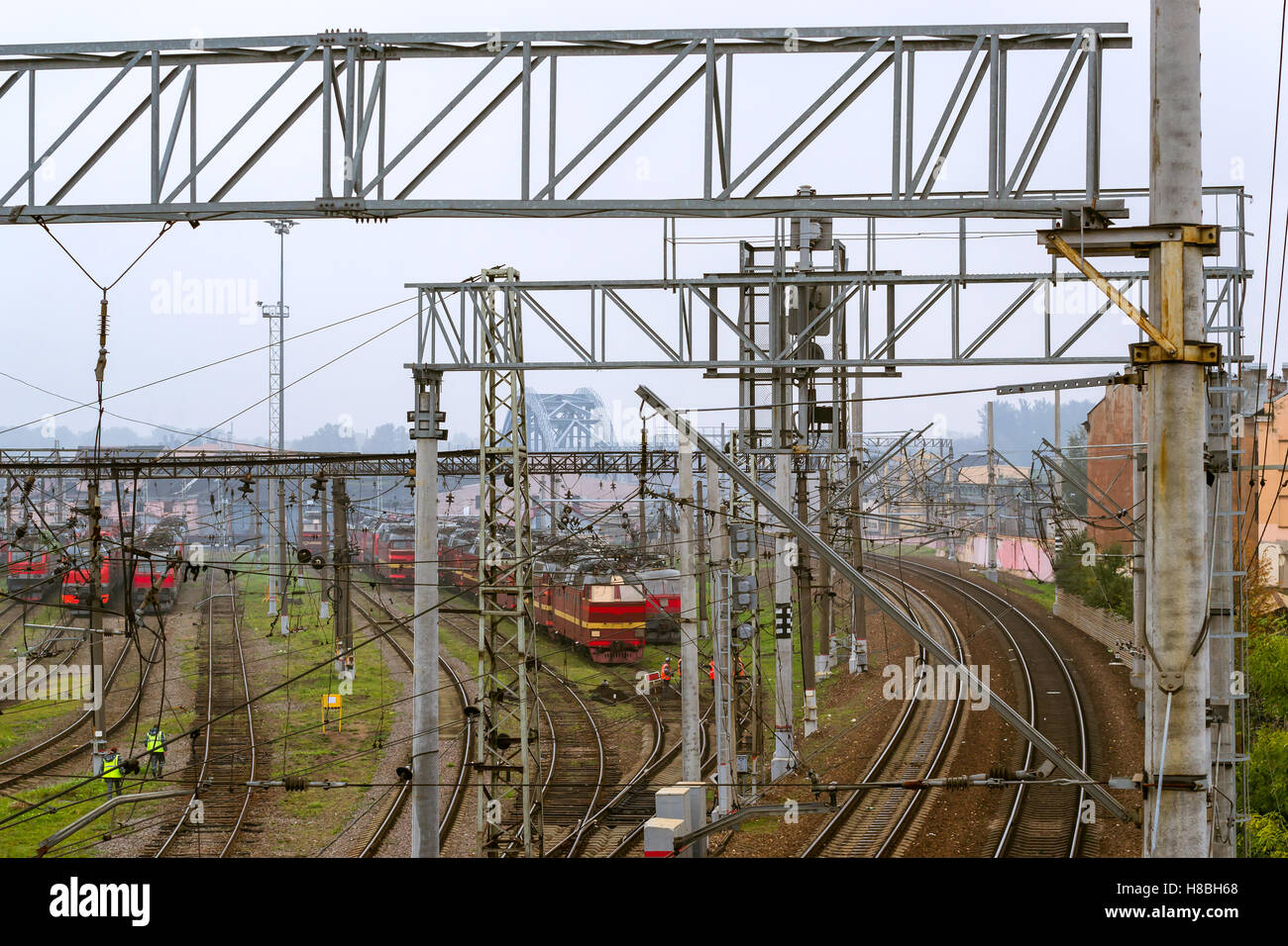 Old locomotives stand on railroad tracks of technical railway station ...
