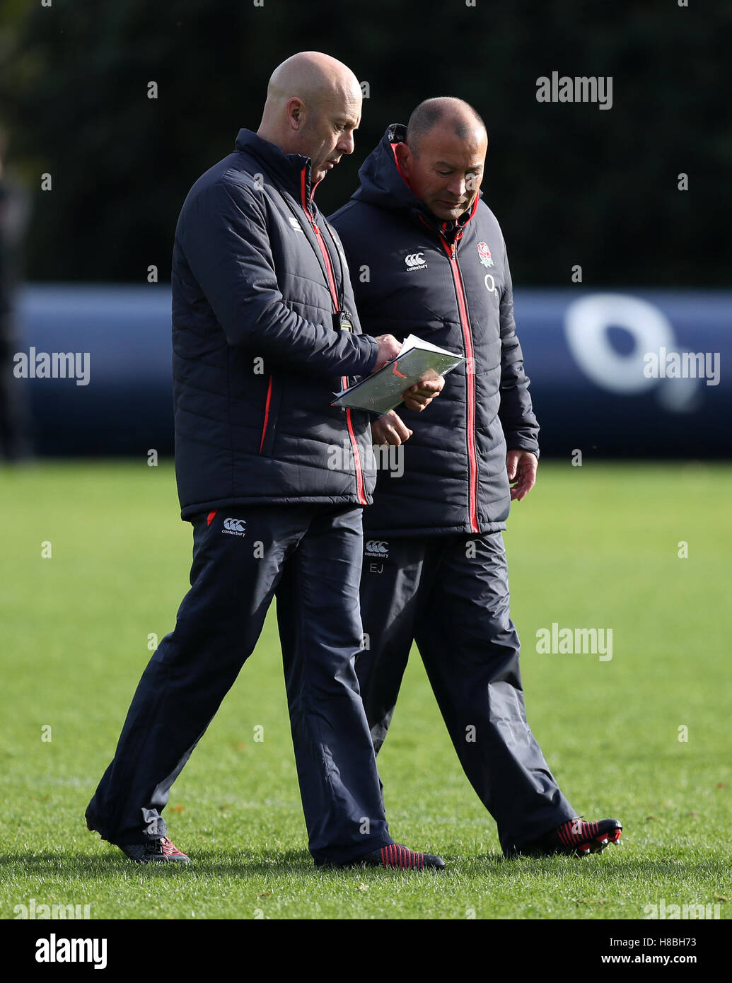 England head coach Eddie Jones chats with strength and conditioning ...