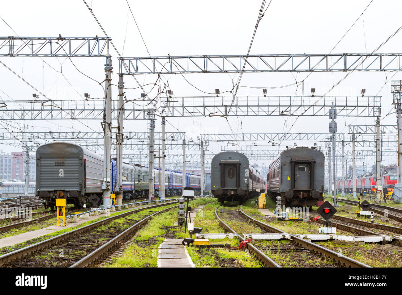 Old locomotives and railcars rzd stand on railroad tracks of technical ...