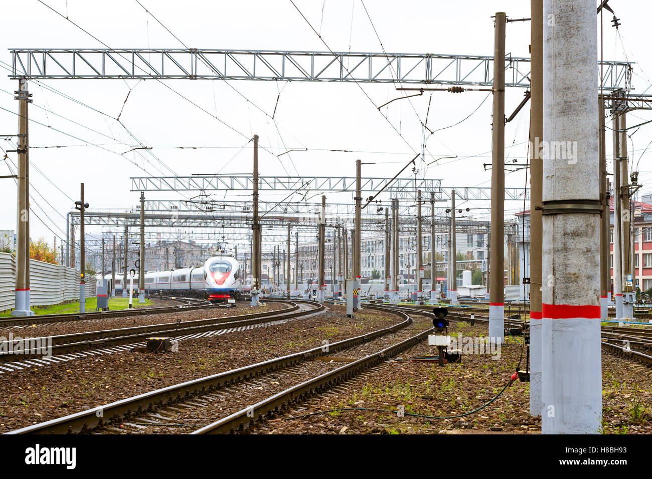 Modern hybrid electric locomotive Sapsan pulling a high-speed train ...