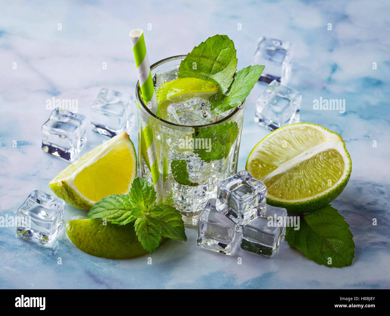 Cocktail mojito with mint, lime and ice. Selective focus Stock Photo ...