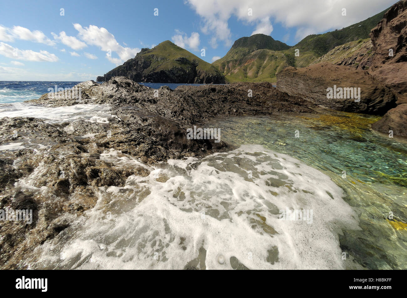 Tidepool near cliffs along shore, Saba, Caribbean Stock Photo - Alamy