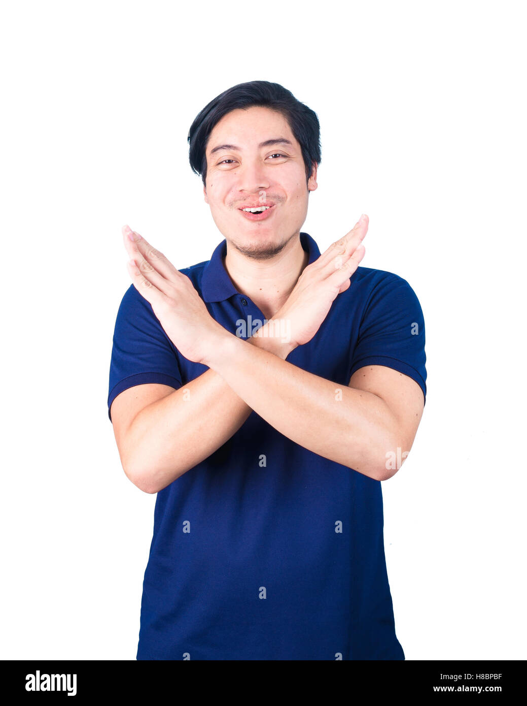 Asian Young man pumped up, making X sign shape with his arms and hands ...