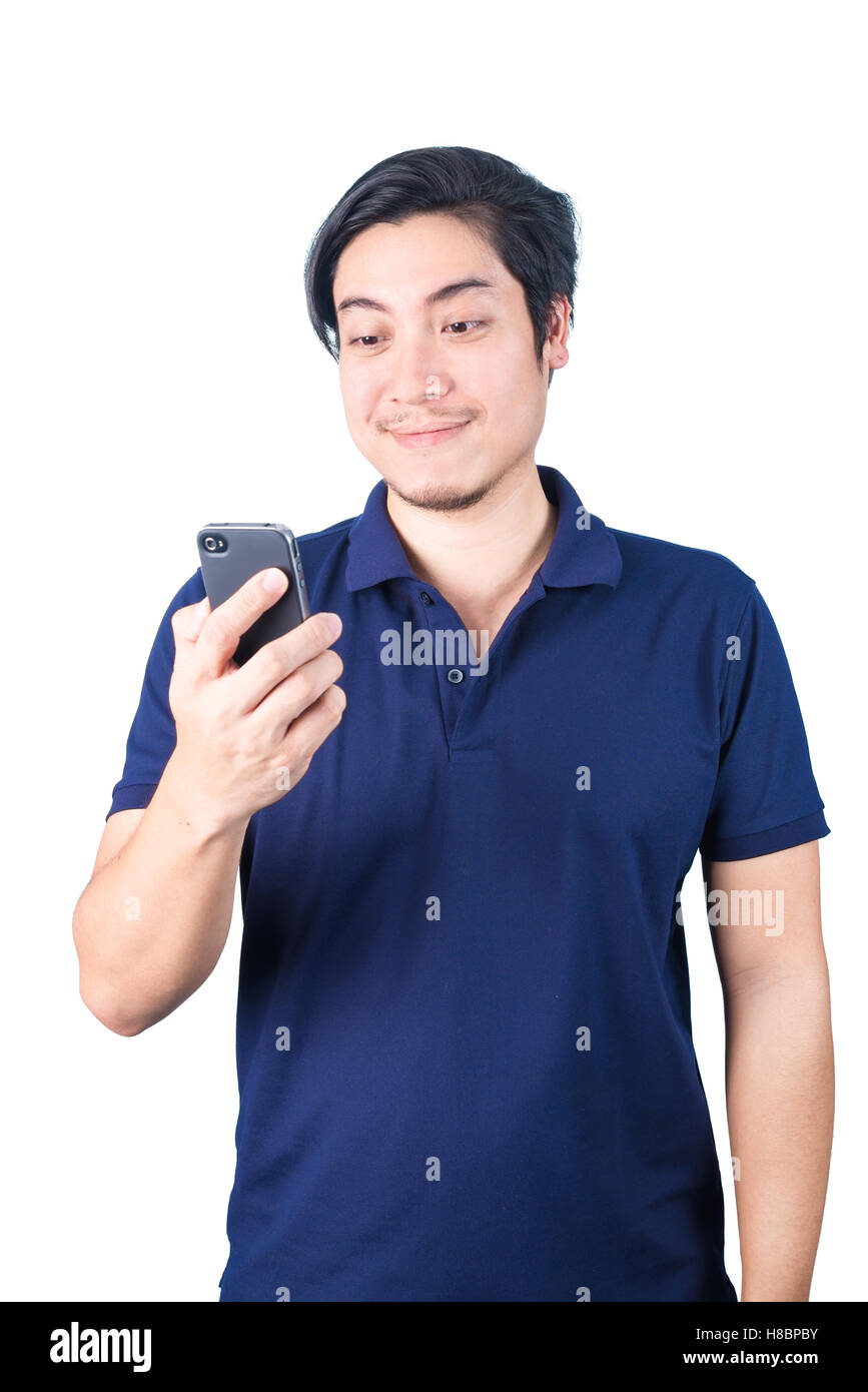 Asian guy with mobile phone in hand speaking, smiling, isolated on ...