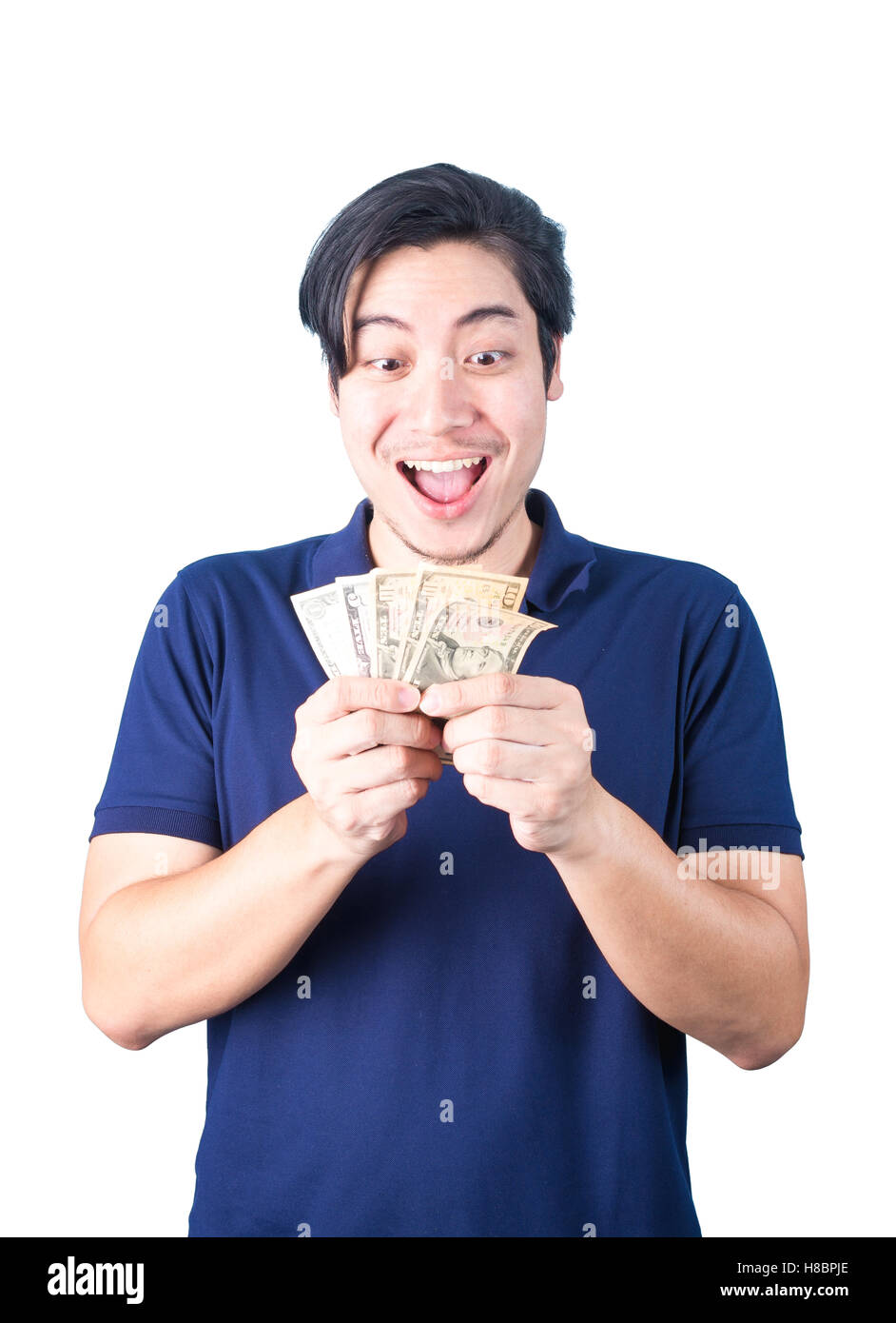 Successful Asian man. Happy young man holding money while standing and ...