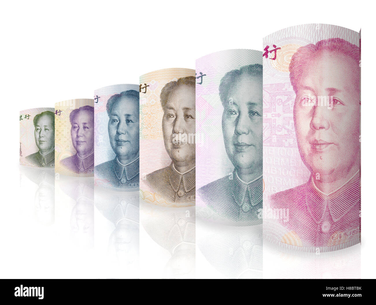 Different money bills standing next to each other forming a row that is ...