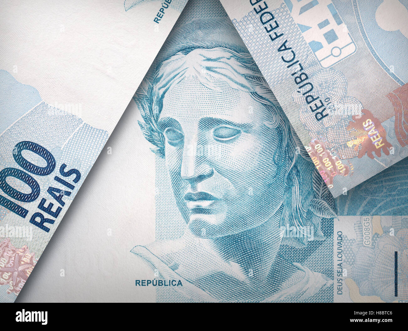Money bills stacked over each other forming a money triangle Stock ...