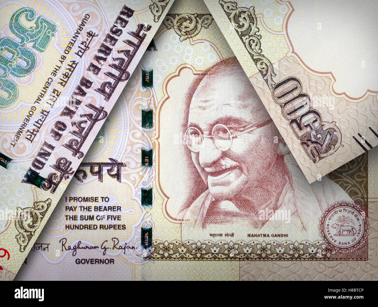 Money bills stacked over each other forming a money triangle Stock ...