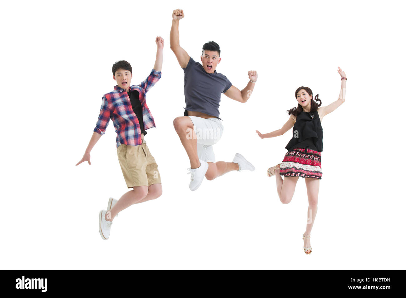 Happy group friends jumping full hi-res stock photography and images ...