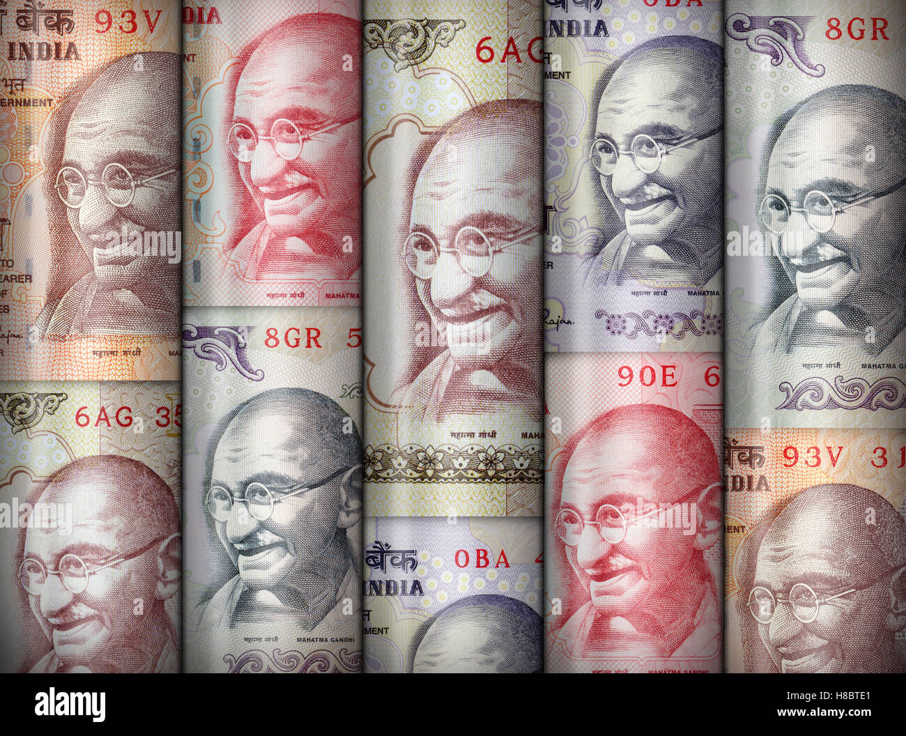 Different money bills stacke over each other forming a money wall Stock ...