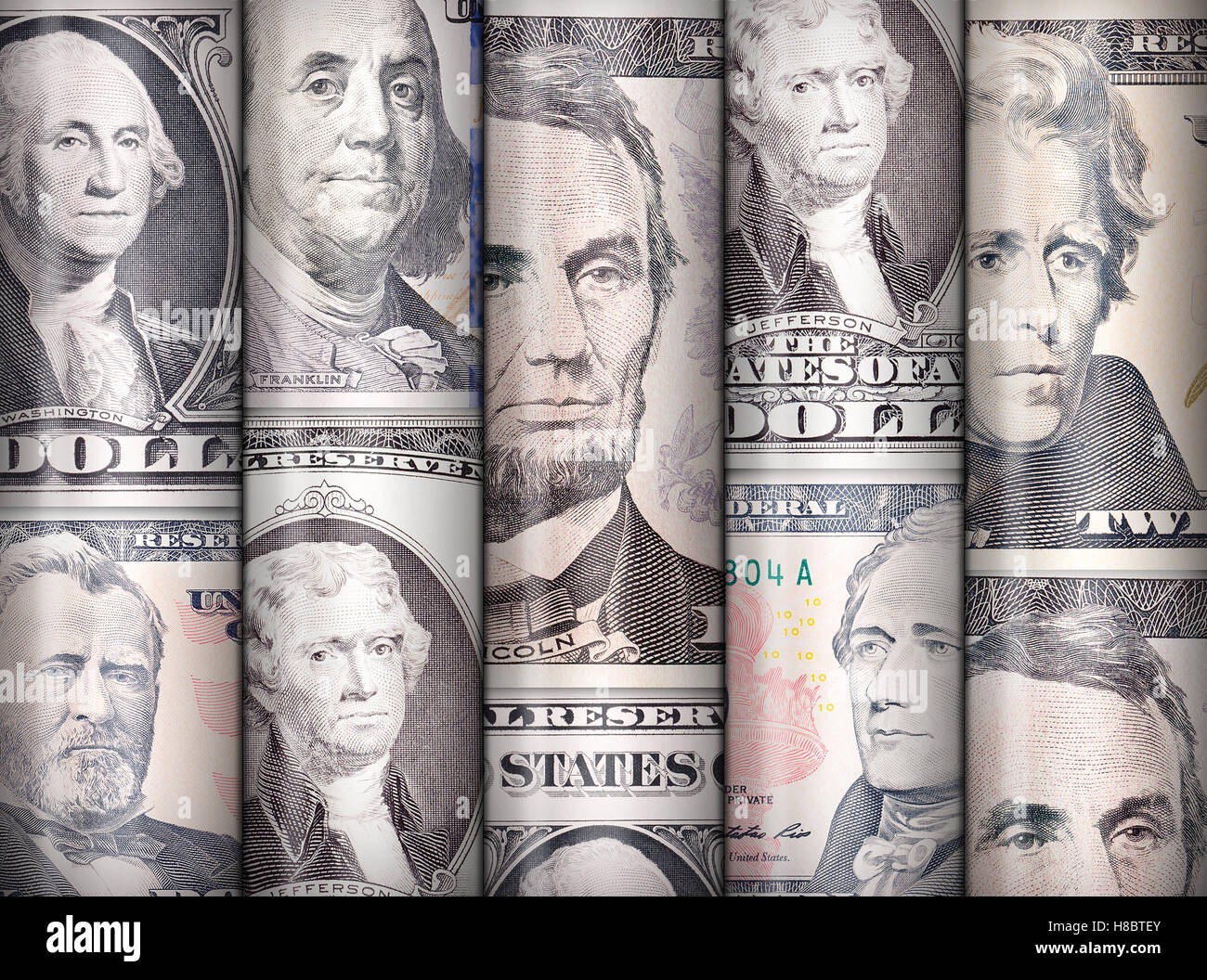 Different money bills stacke over each other forming a money wall Stock ...