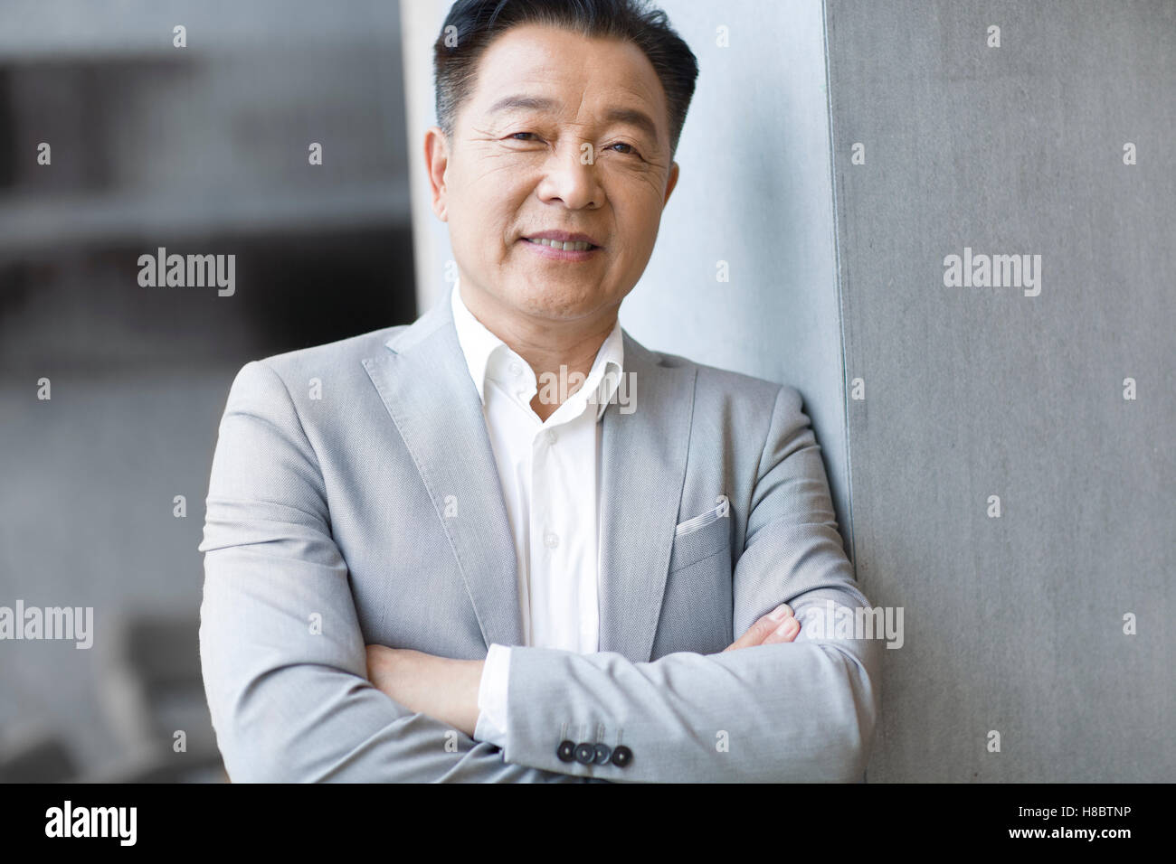 Portrait of confident Chinese businessman Stock Photo - Alamy