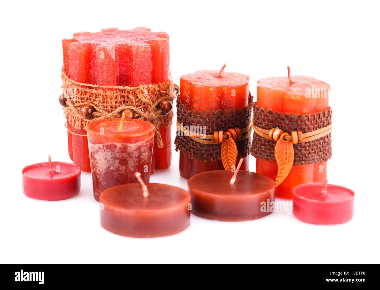 Many candles isolated on white background Stock Photo - Alamy