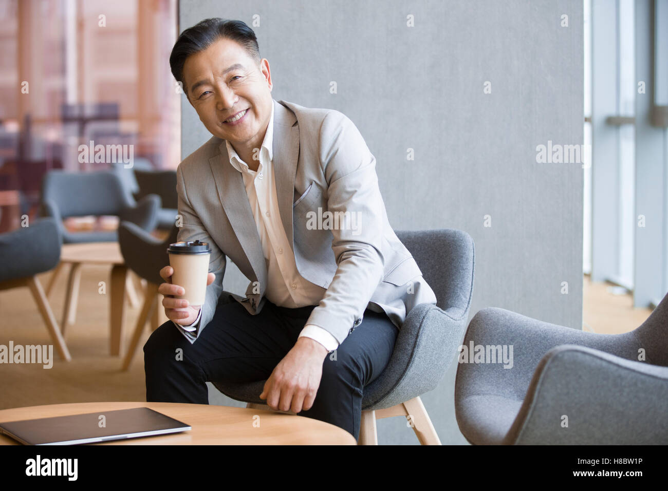 Portrait of confident Chinese businessman Stock Photo - Alamy