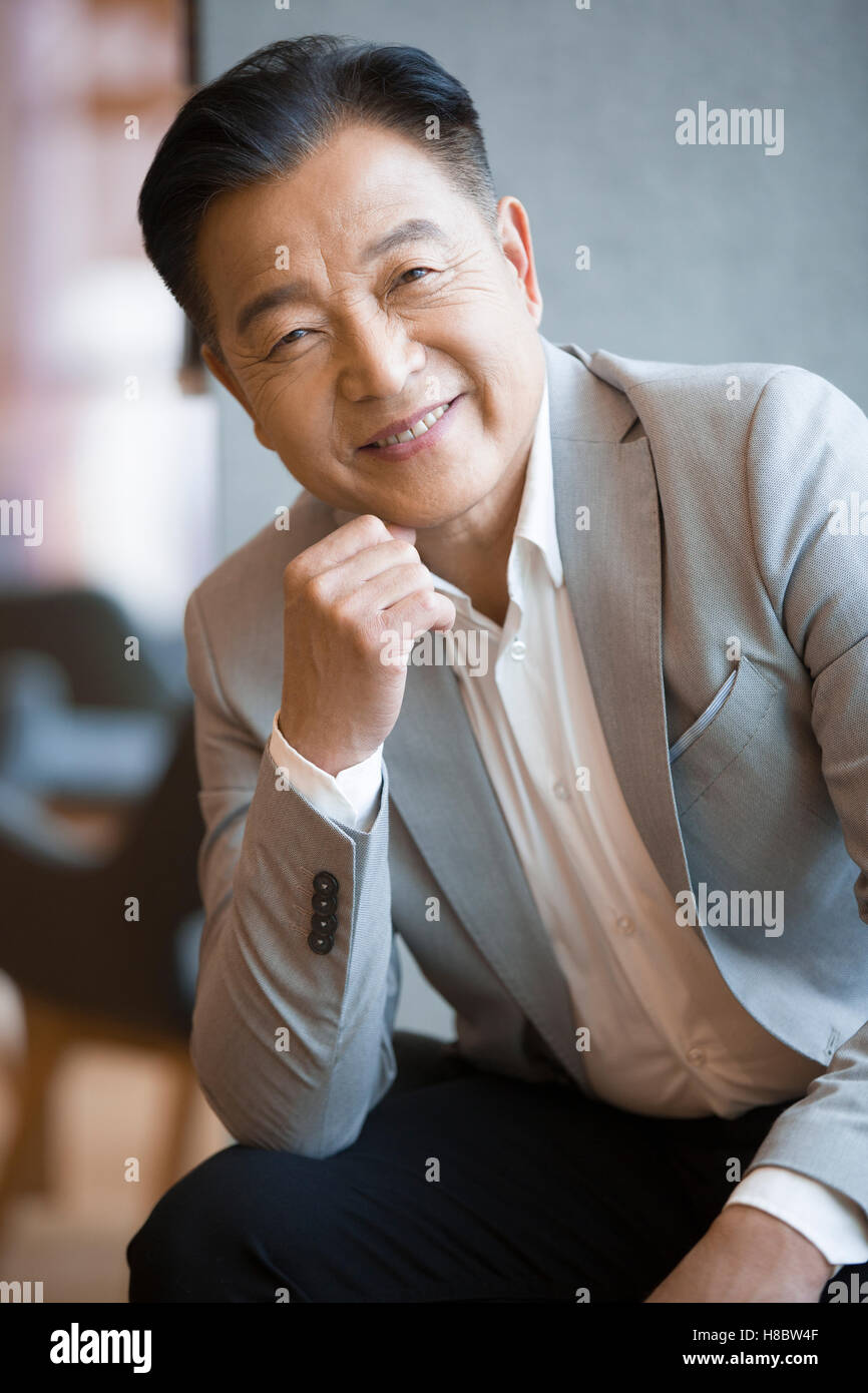 Portrait of confident Chinese businessman Stock Photo - Alamy