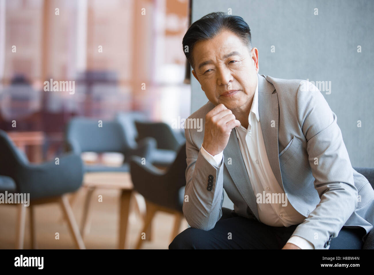 Confidence businessman in gold suit hi-res stock photography and images ...