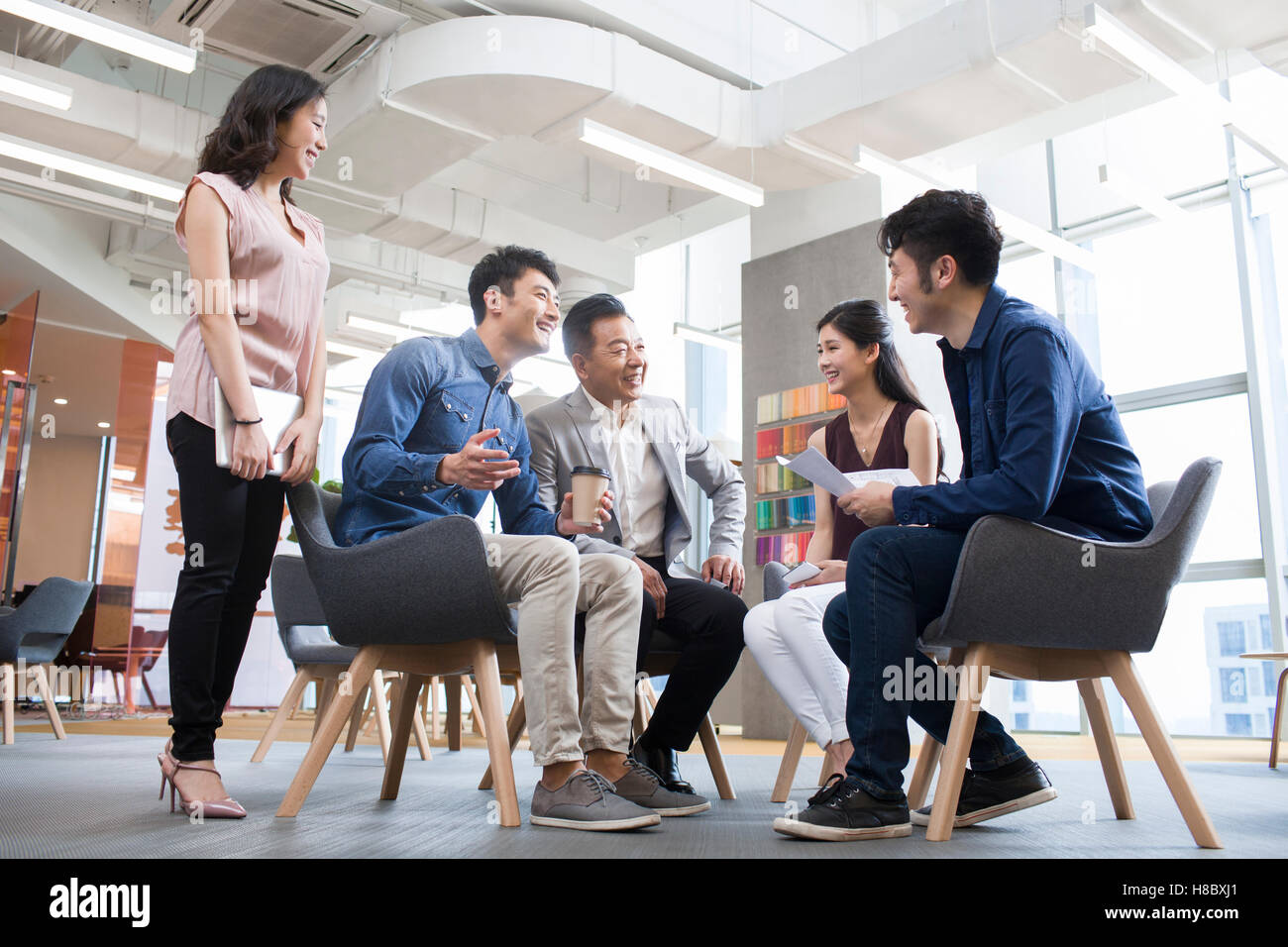 Chinese business people talking in meeting Stock Photo - Alamy