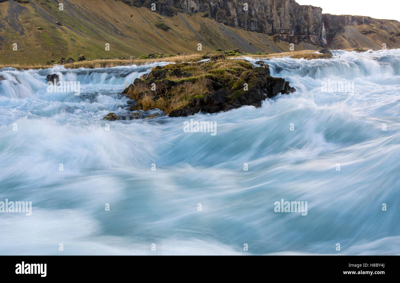 Water rushes along a river in southern Iceland Stock Photo - Alamy