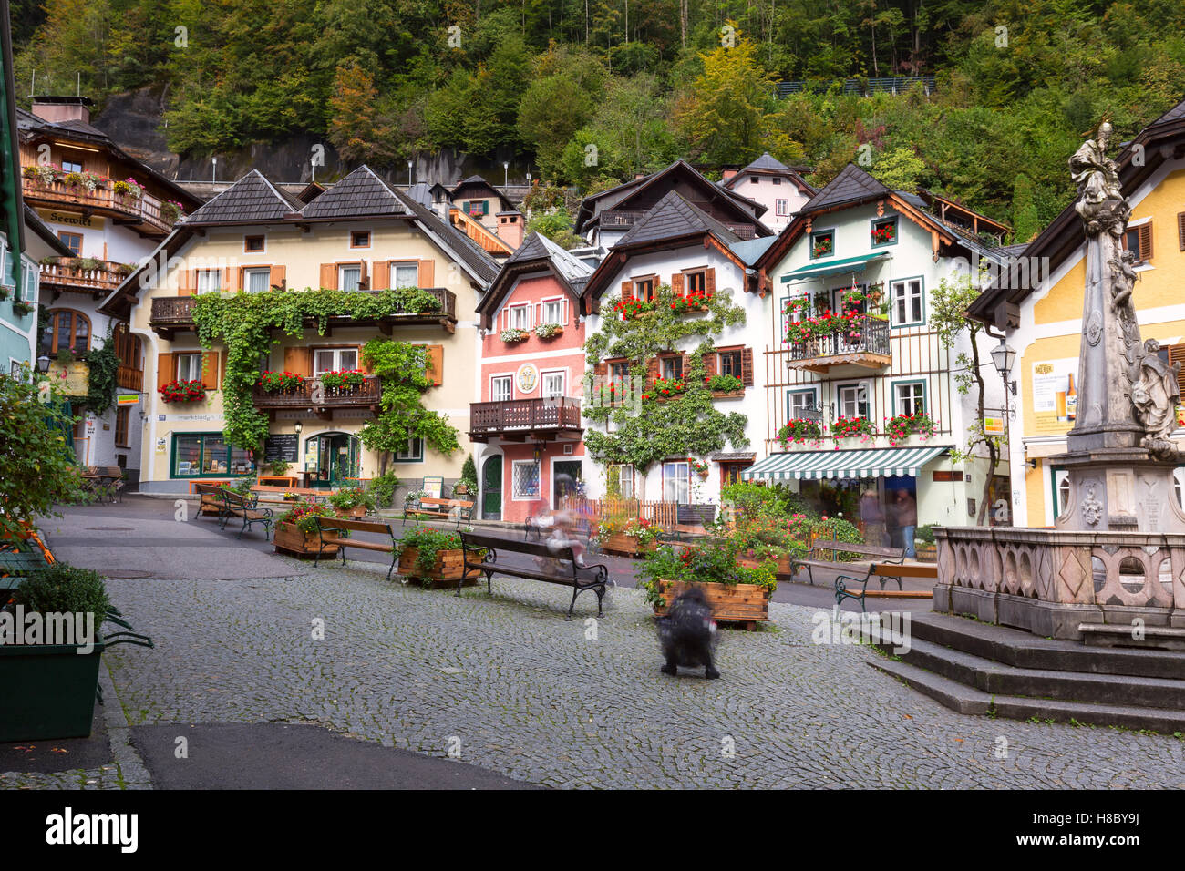 Historic town square of Hallstatt with traditional colorful houses ...