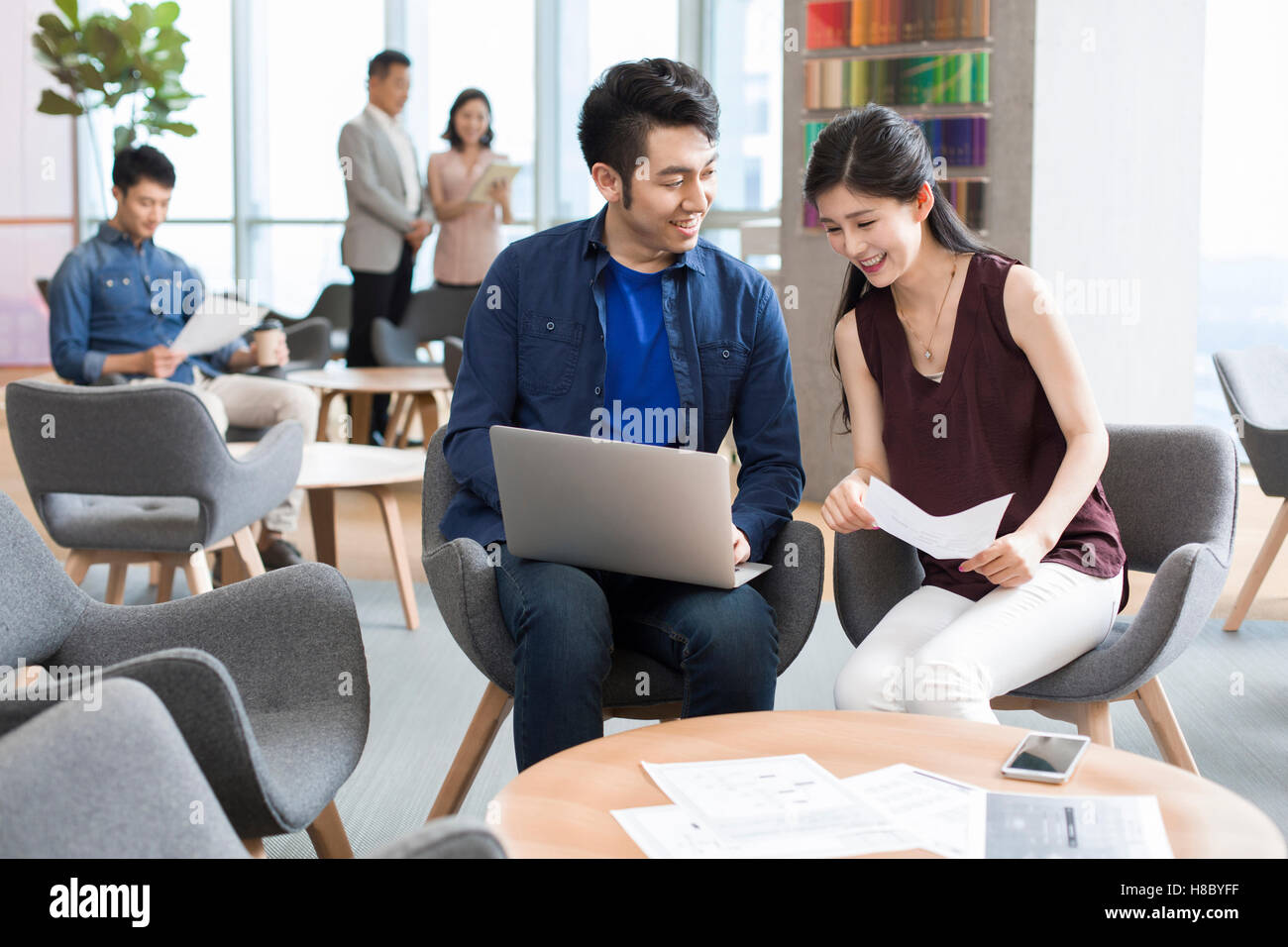 Chinese business people working in office Stock Photo - Alamy