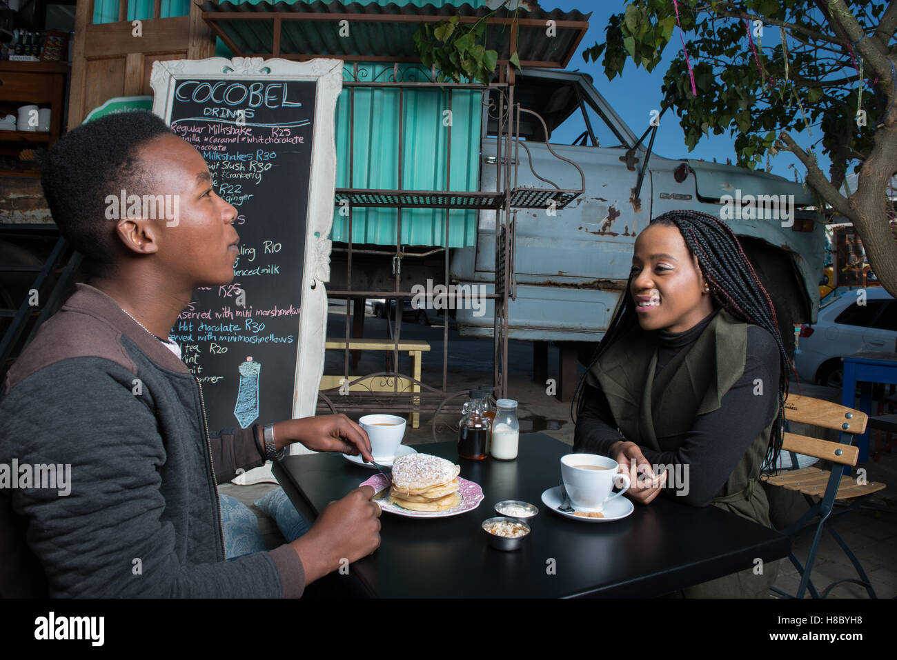 African woman eating food shop hi-res stock photography and images - Alamy